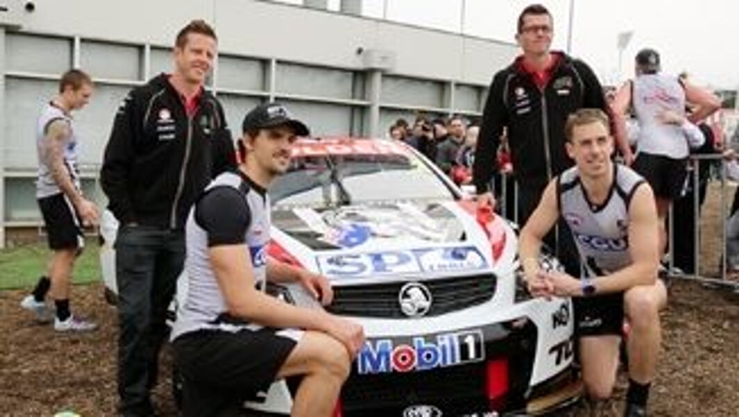 Collingwood stands Side By Side with Holden