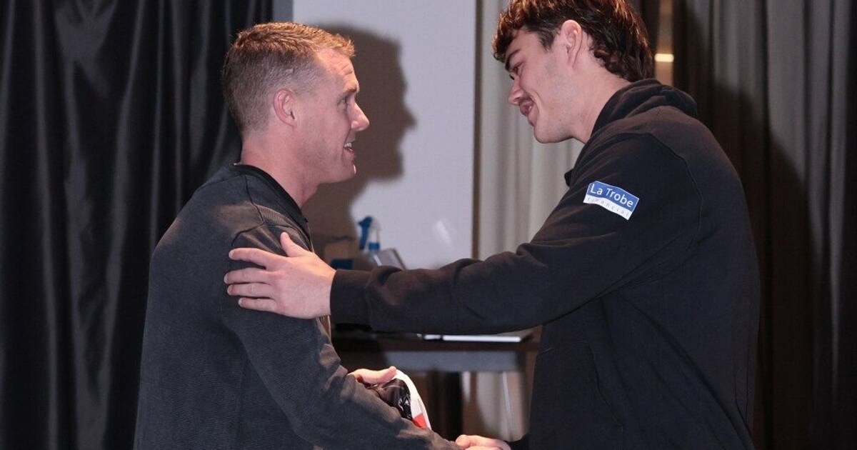 Tarks presents Josh with his jumper