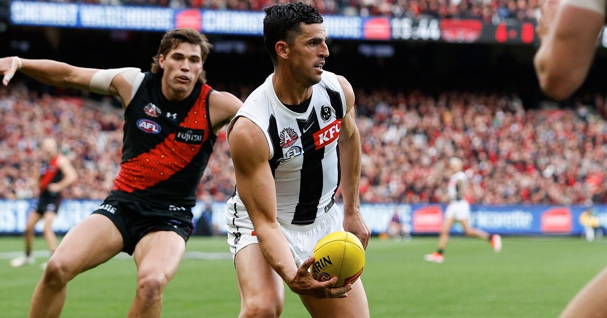 Ball magnet: Pies great makes history on Anzac Day stage